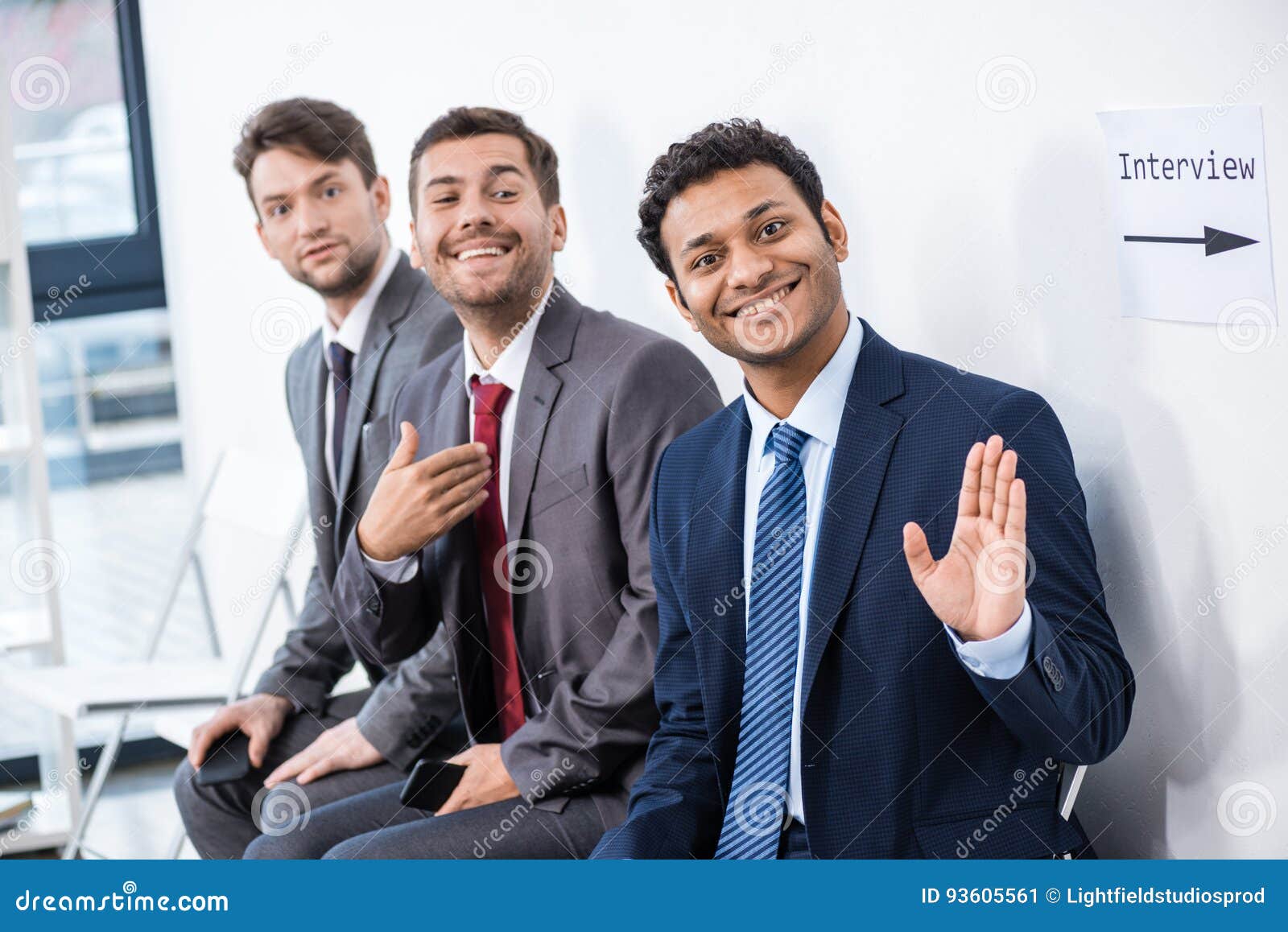 Businessmen Sitting in Queue and Waiting for Interview in Office Stock ...