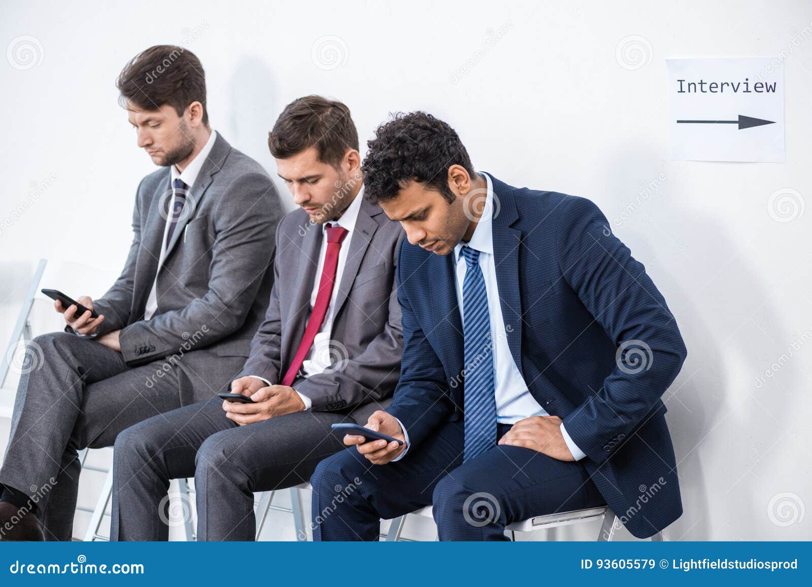 Businessmen Sitting in Queue and Waiting for Interview in Office Stock ...