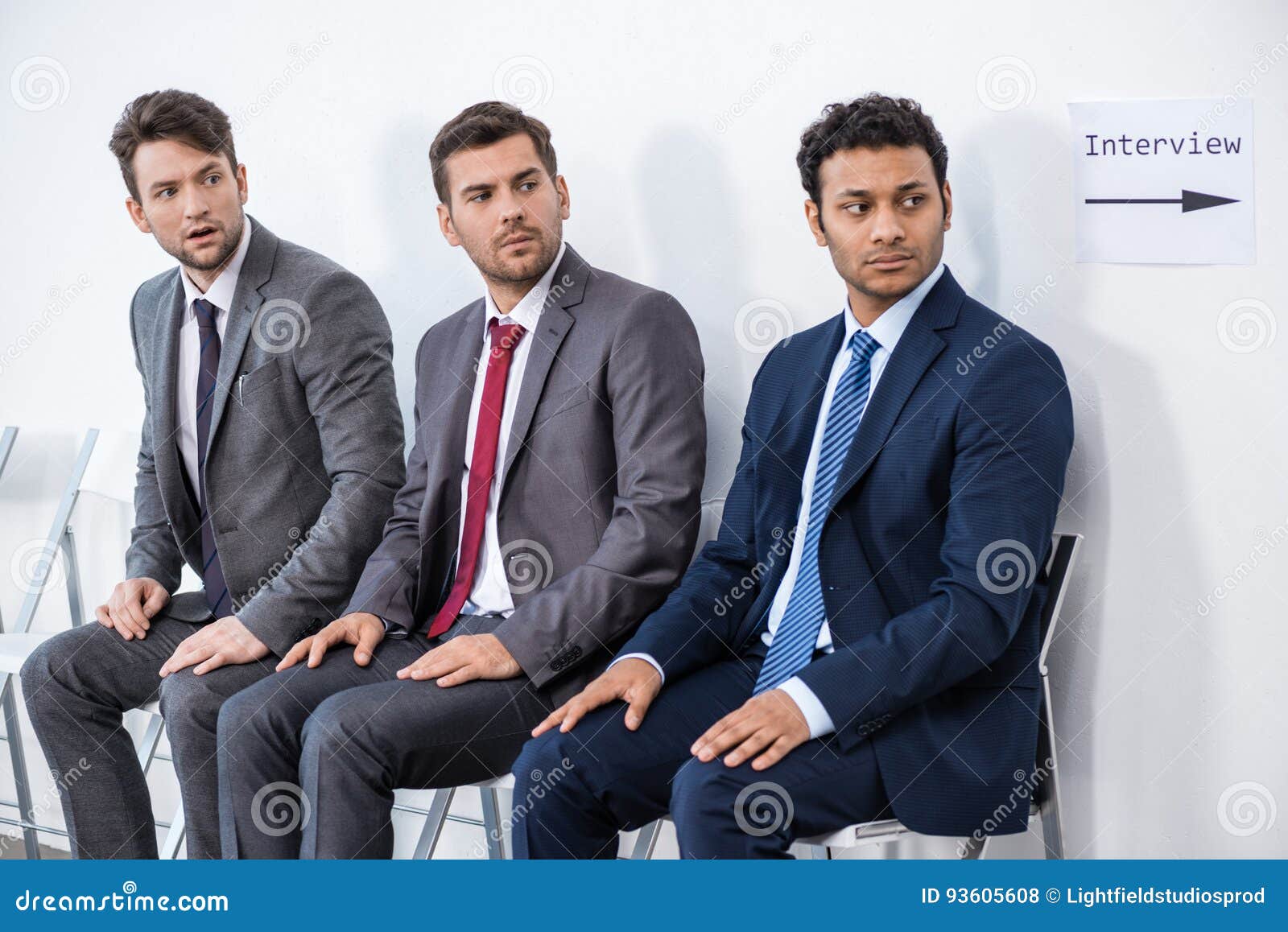 Businessmen Sitting in Queue and Waiting for Interview in Office Stock ...