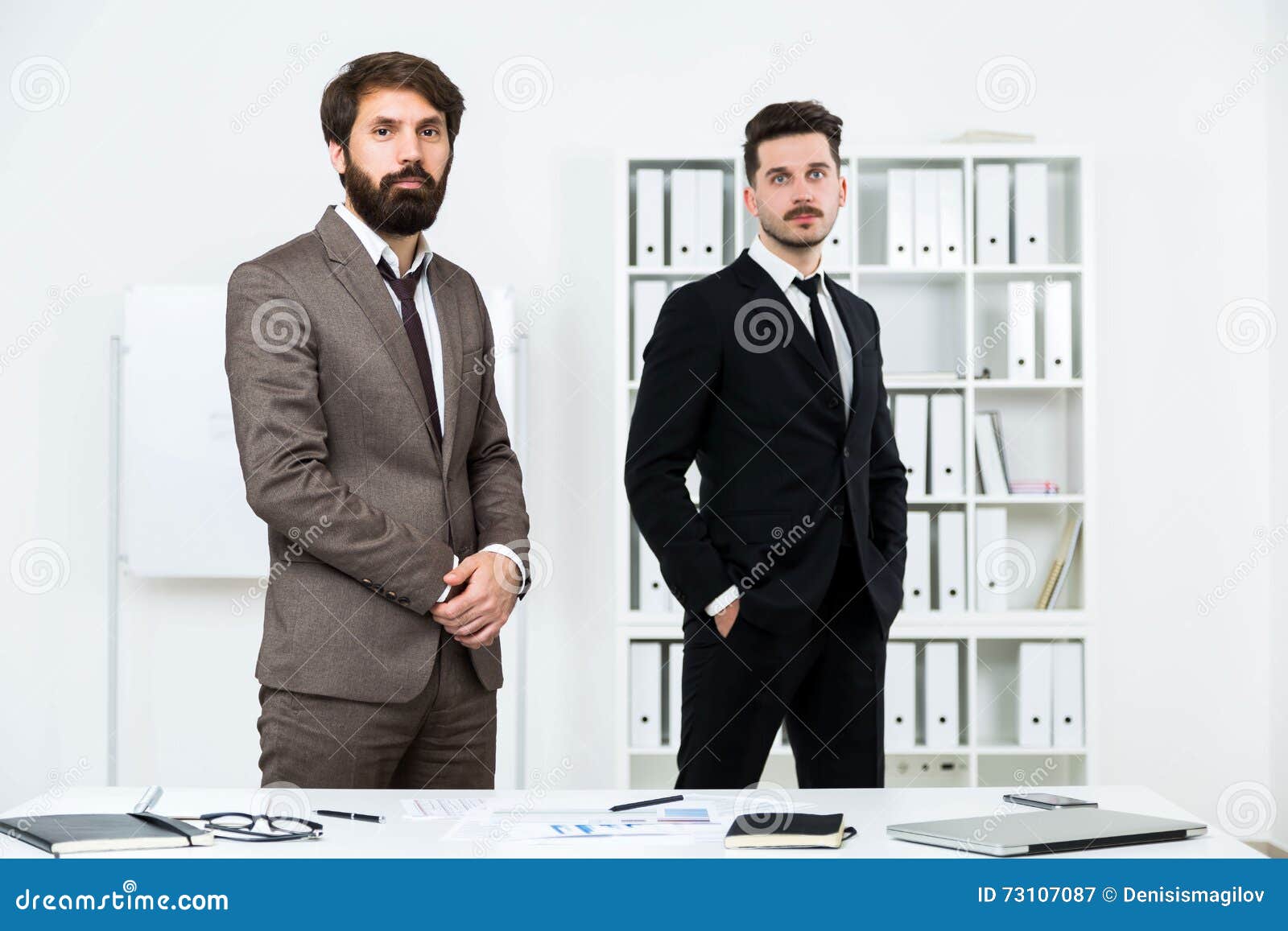 Businessmen Standing in Office Stock Image - Image of colleagues ...