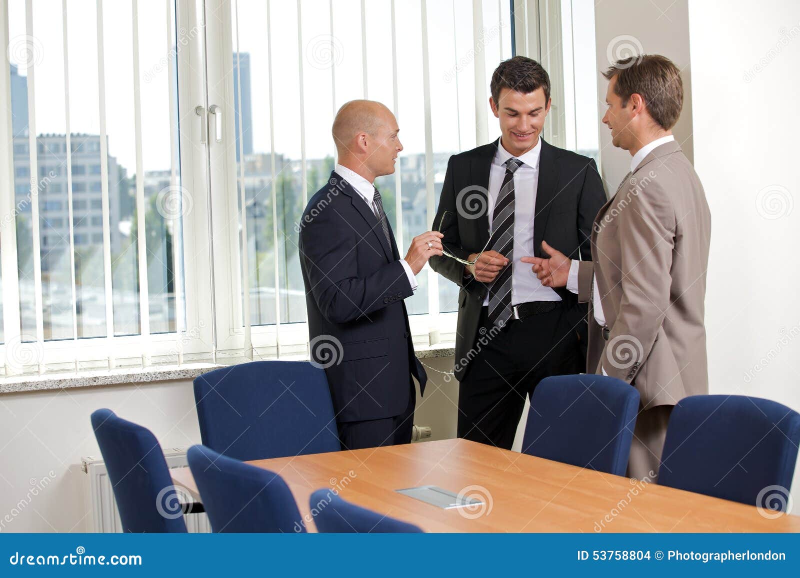 Businessmen Talking in Conference Room Stock Photo - Image of 2024 ...