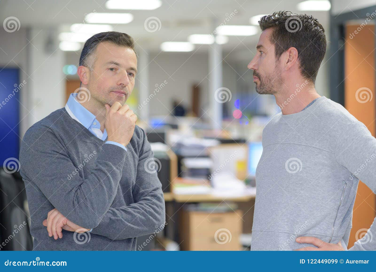 Businessmen Talking at Creative Work Space Stock Image - Image of blur ...