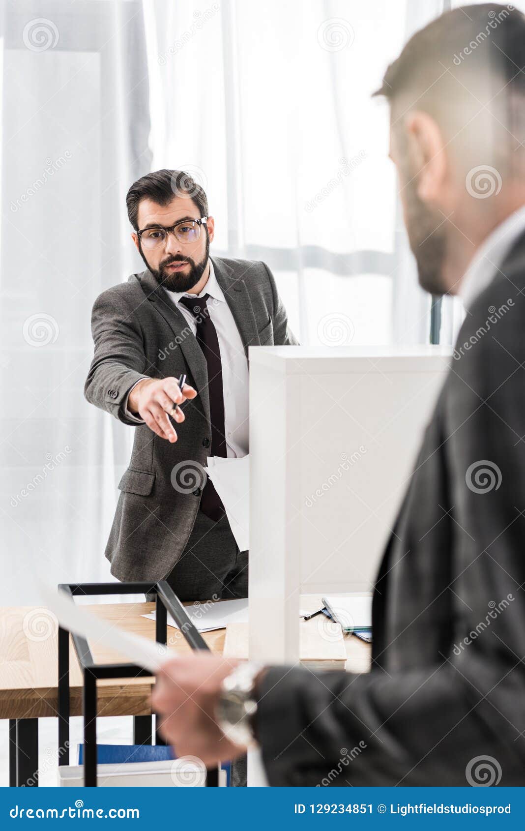 Businessmen Talking about Documents Stock Image - Image of work ...
