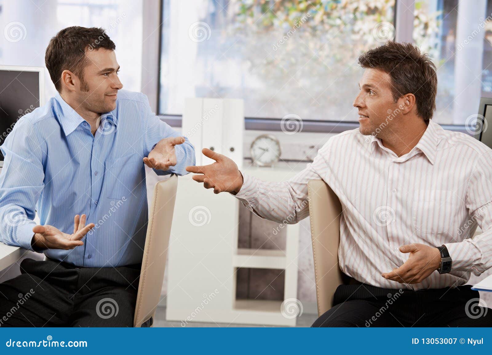 Businessmen Talking in Office Stock Image - Image of bright ...