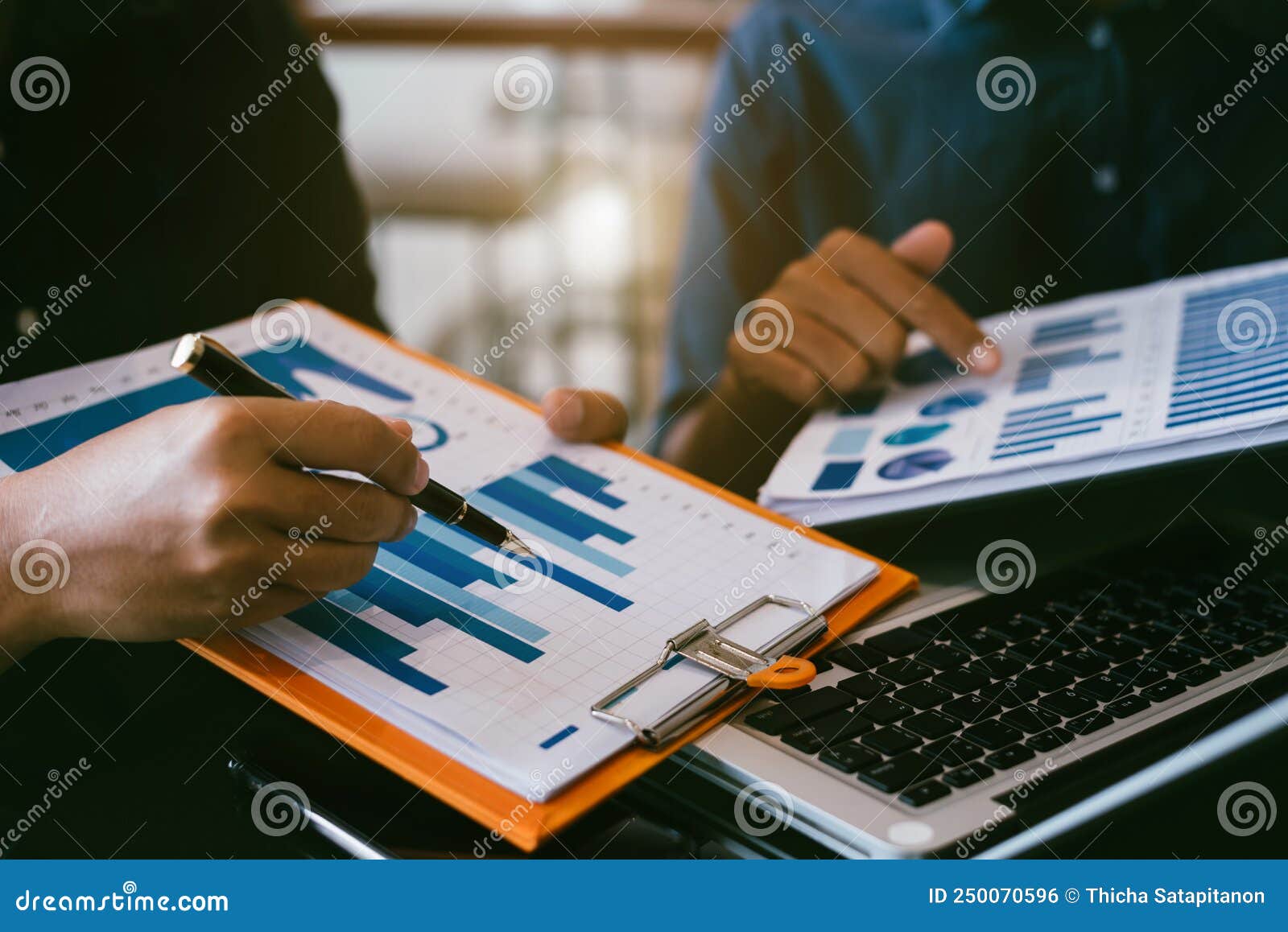 Businessmen Team or Financial Data Analysts Working with Data Graphs ...