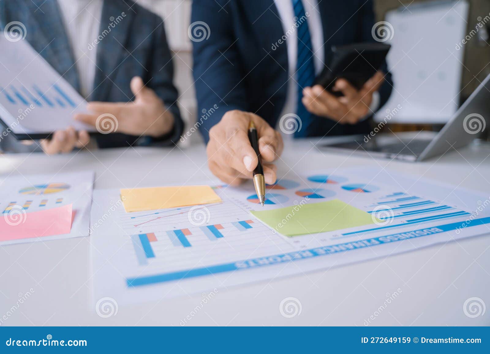 Businessmen Team or Financial Data Analysts Working with Tablets and ... Businessmen Team or Financial Data Analysts Working with Tablets and ...