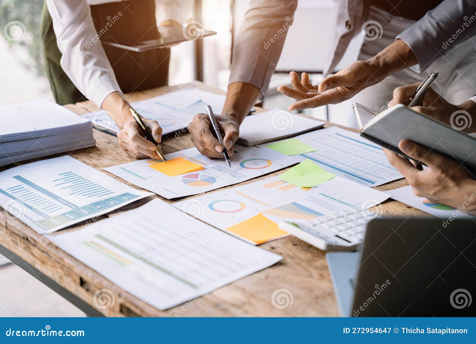 Businessmen Team or Financial Data Analysts Working with Tablets and ... Businessmen Team or Financial Data Analysts Working with Tablets and ...