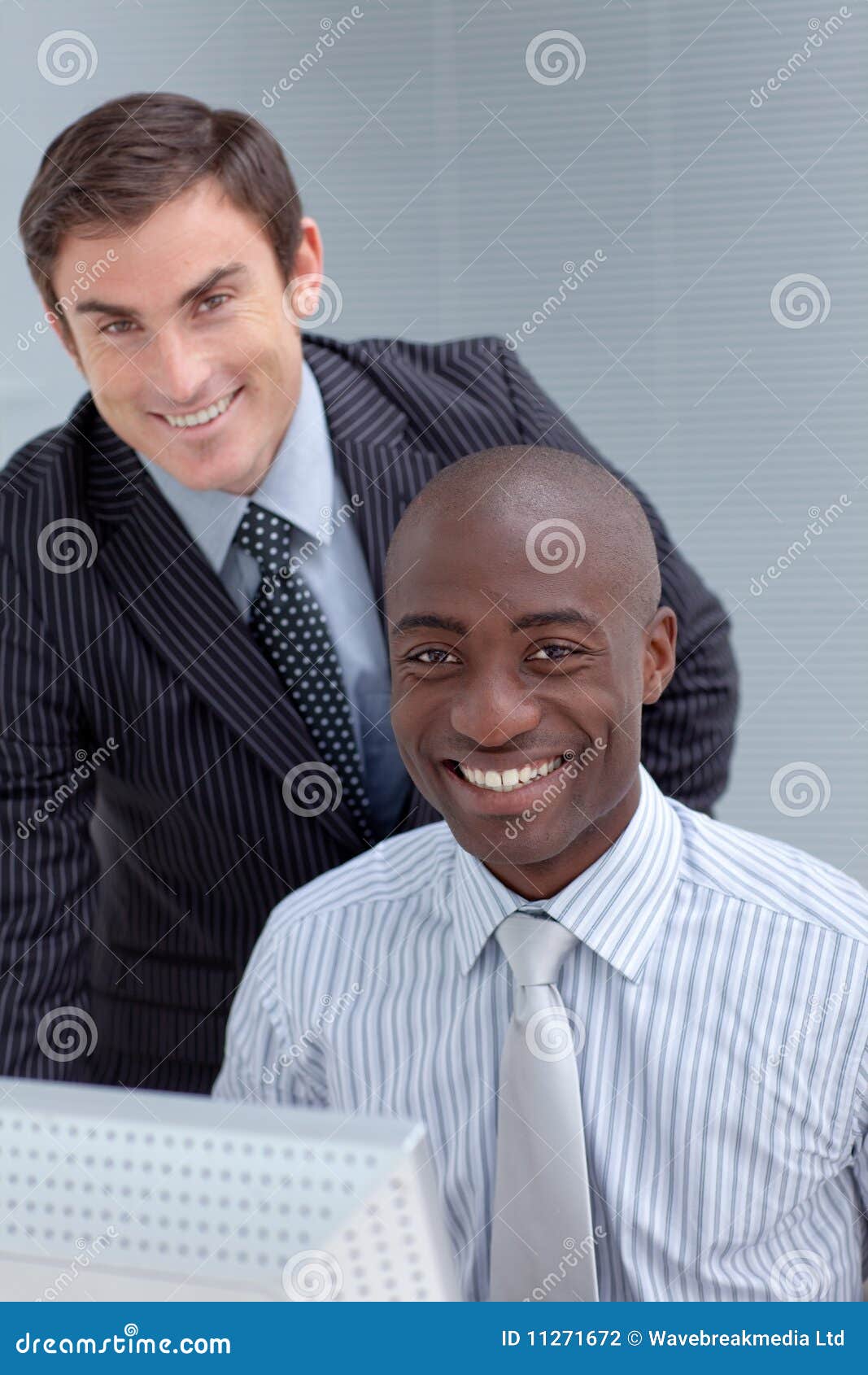 Businessmen Using a Computer Together Stock Photo - Image of adult ...