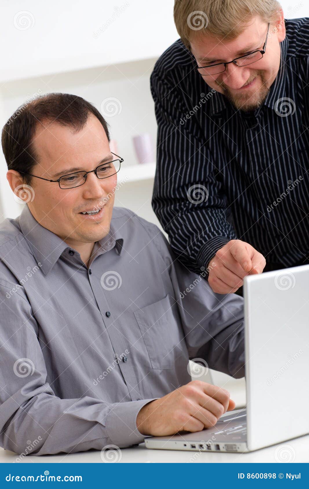 Businessmen Using Laptop Computer Stock Photo - Image of face, computer ...