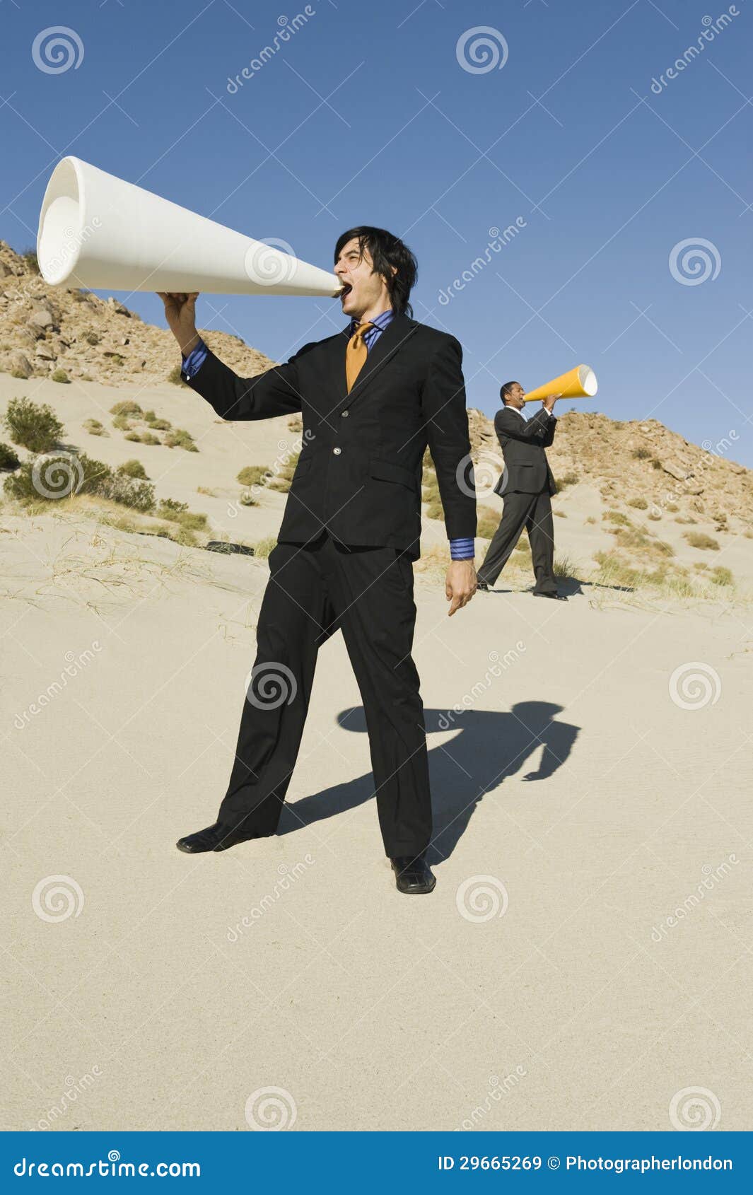 Businessmen Using Megaphones in Desert Stock Image - Image of hailer ...