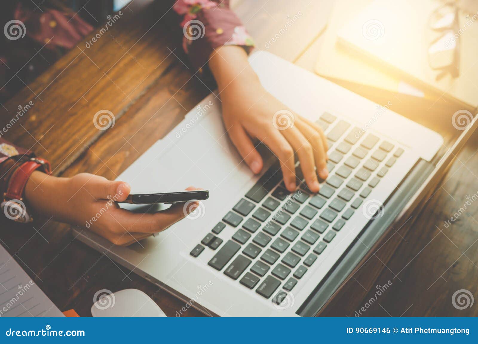 Businessmen are Using Their Mobile To Work with a Laptop. Stock Photo ...