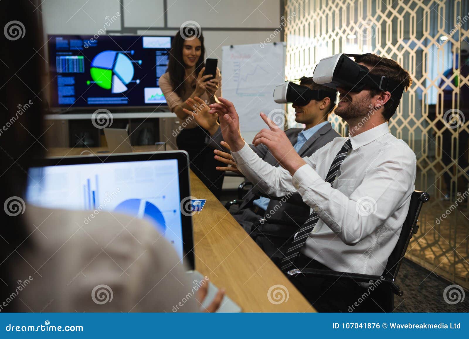 Businessmen Using Virtual Reality Headset in Conference Room Stock ... Businessmen Using Virtual Reality Headset in Conference Room Stock ...