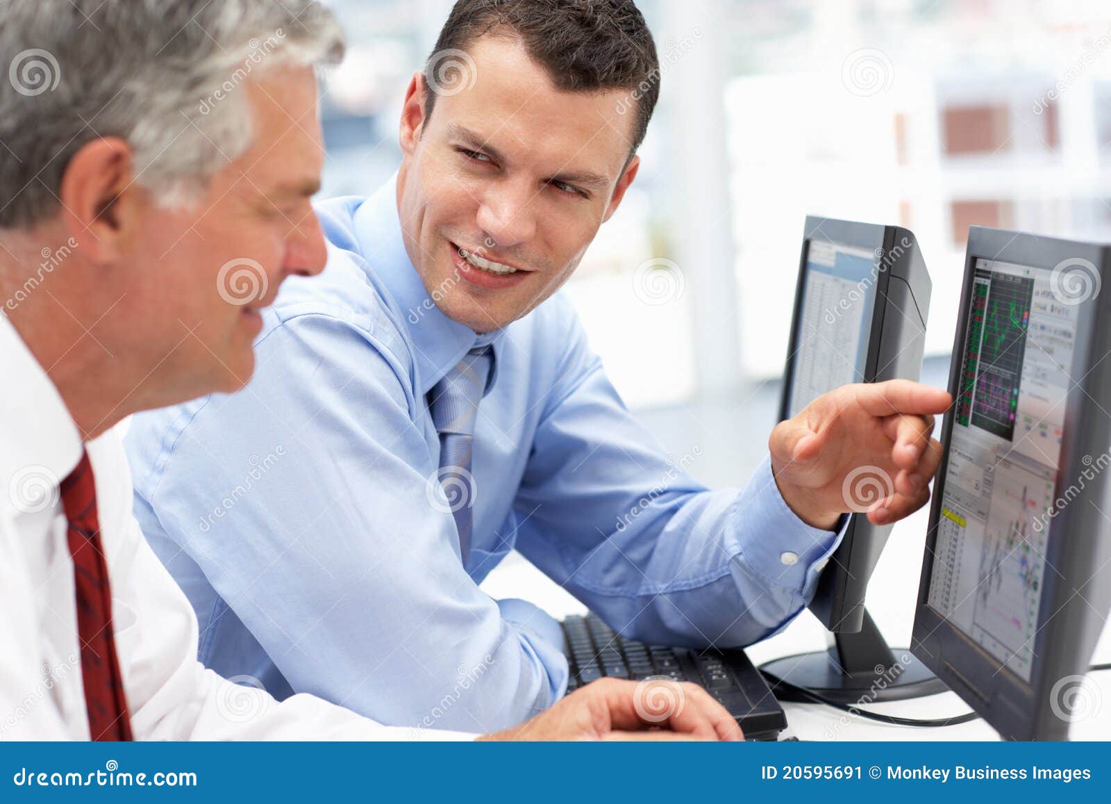 Businessmen Working on Computers Stock Image - Image of businessmen ...
