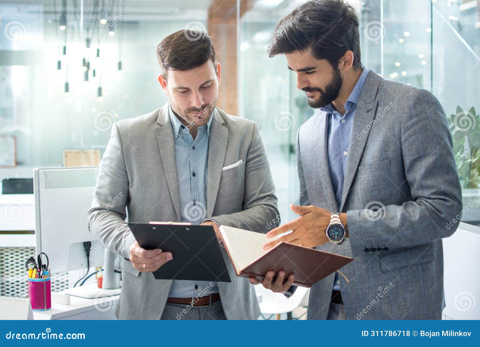 Businessmen Working with Documents Together in Office. Stock Photo ...
