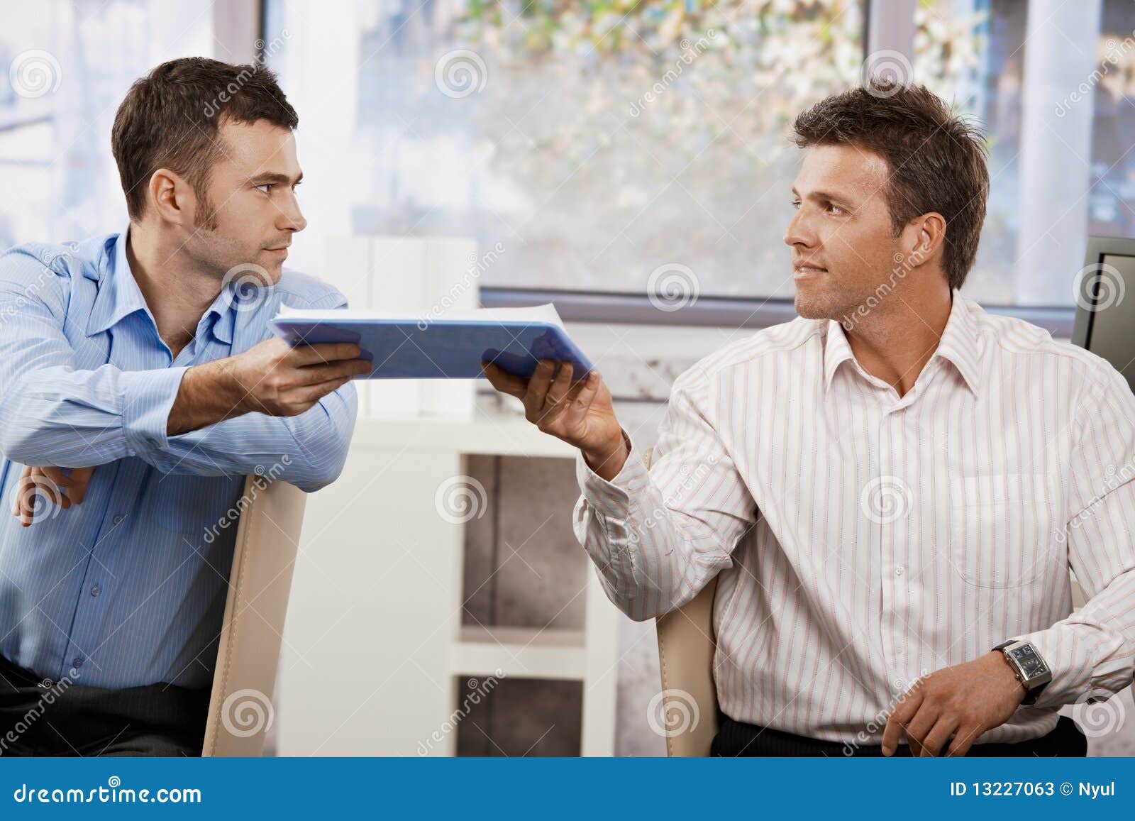 Businessmen Working in Office Stock Image - Image of horizontal, giving ...