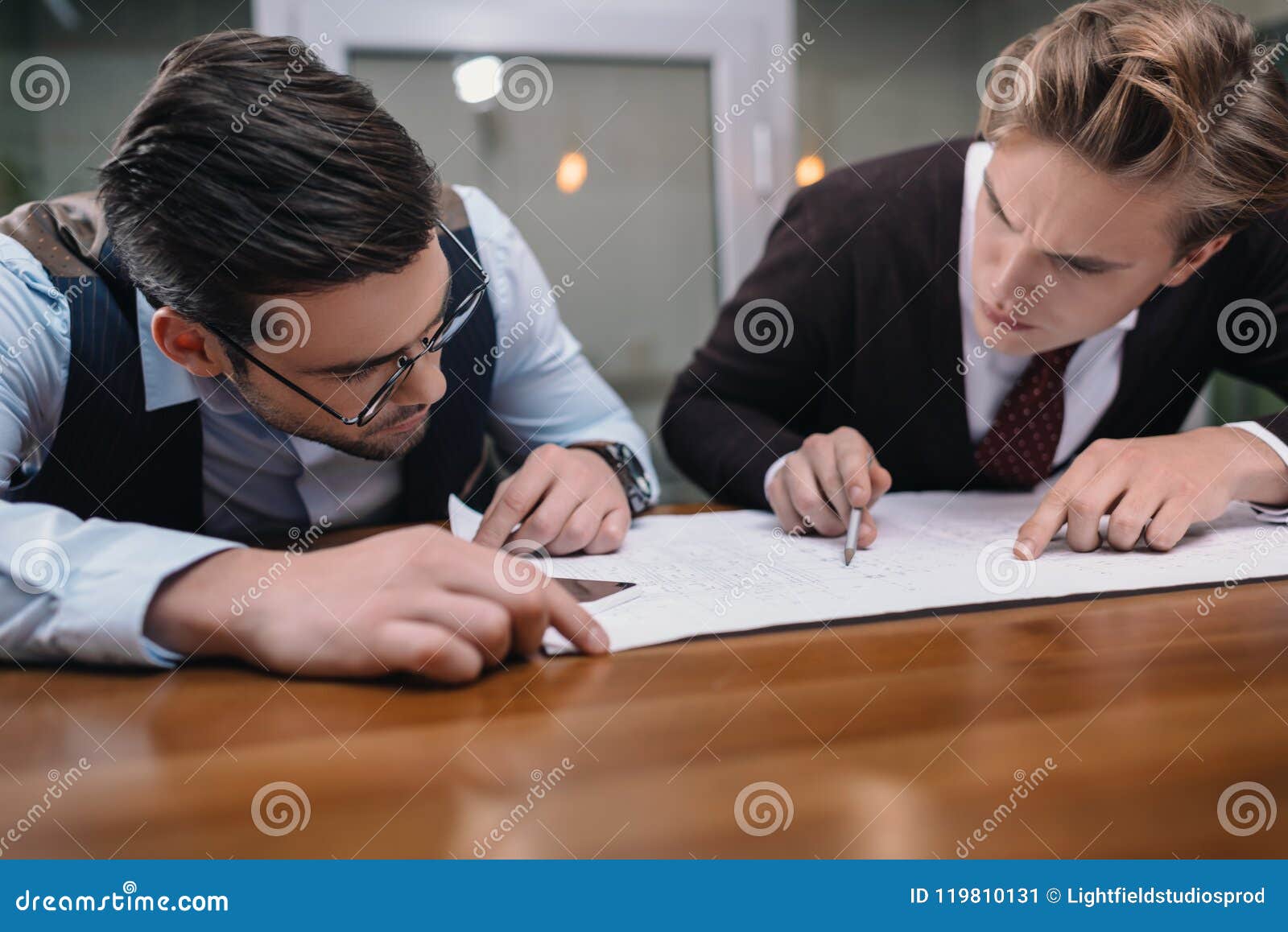 Businessmen Working Together with Blueprint Stock Image - Image of work ...