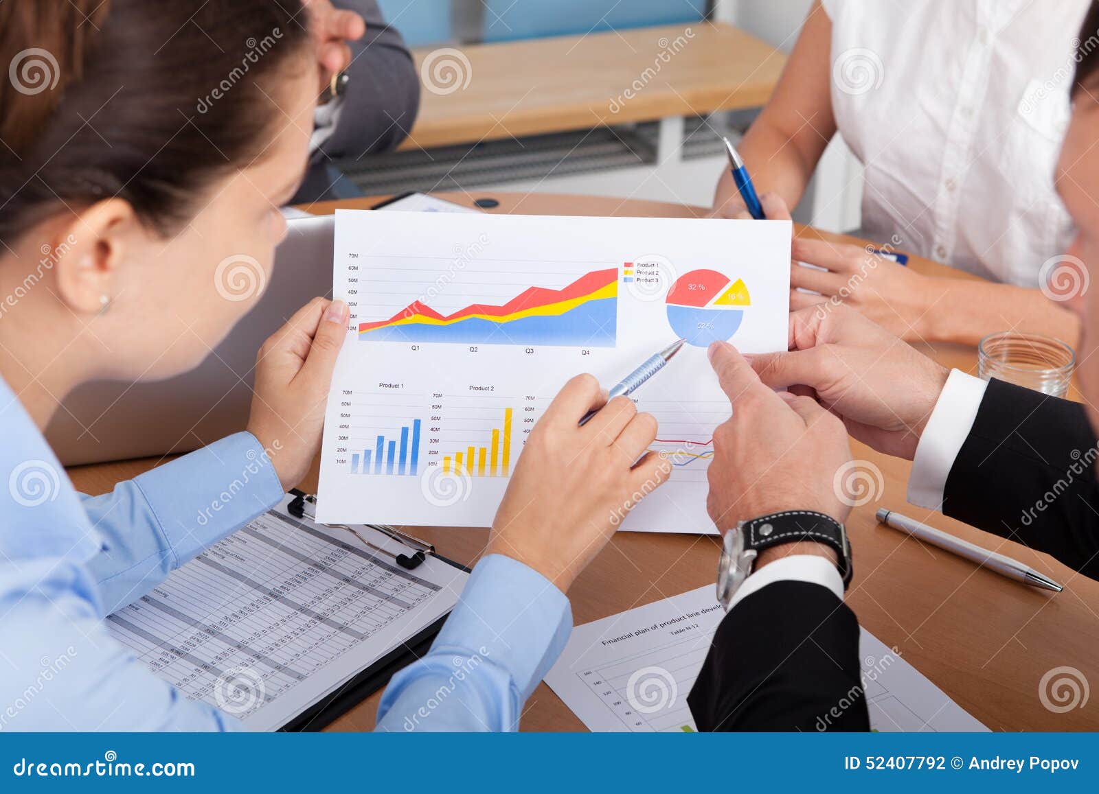Businesspeople Analyzing Graph Stock Photo - Image of paper, financial ...