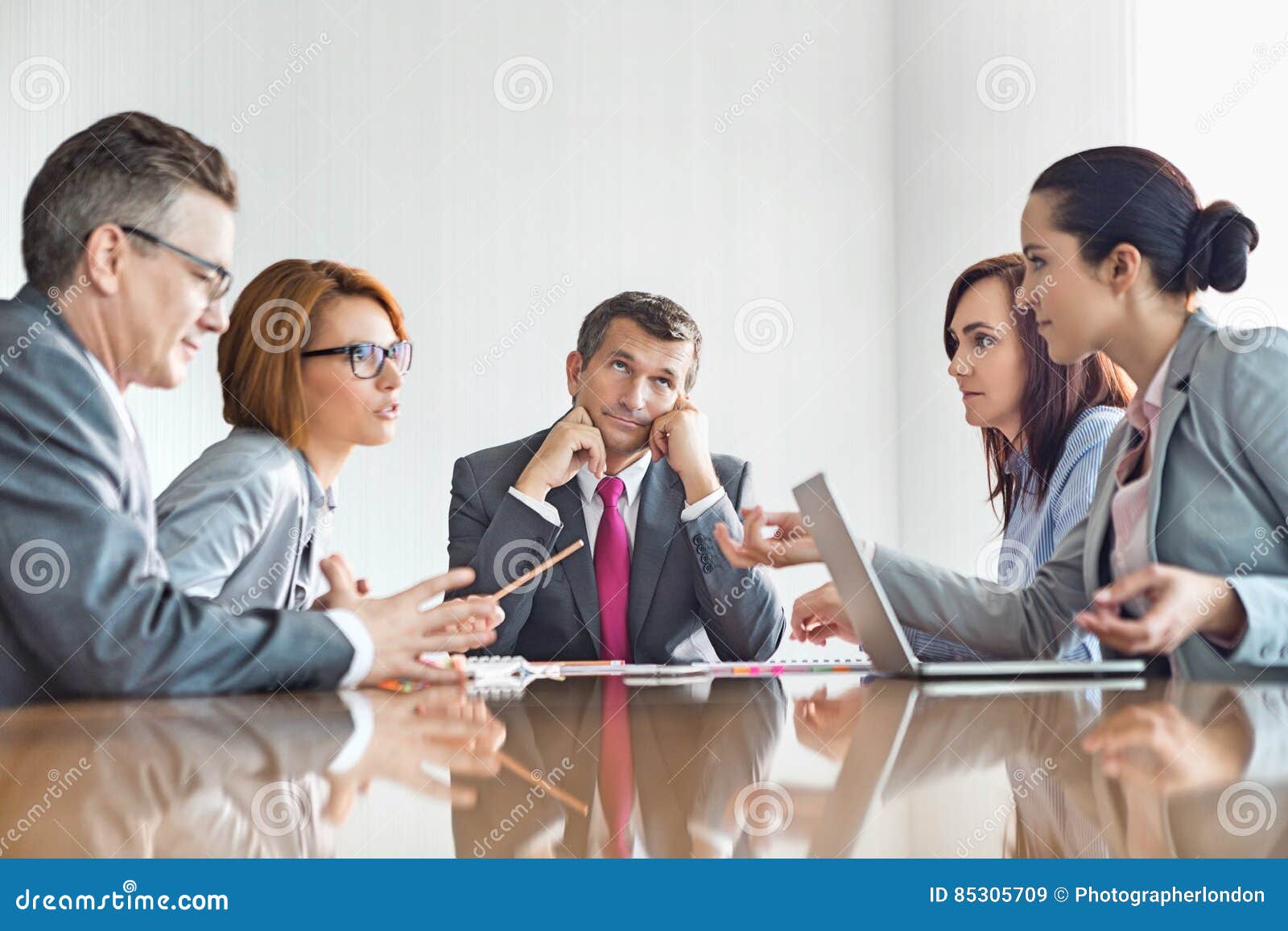 Businesspeople Arguing in Meeting Stock Image - Image of laptop ...
