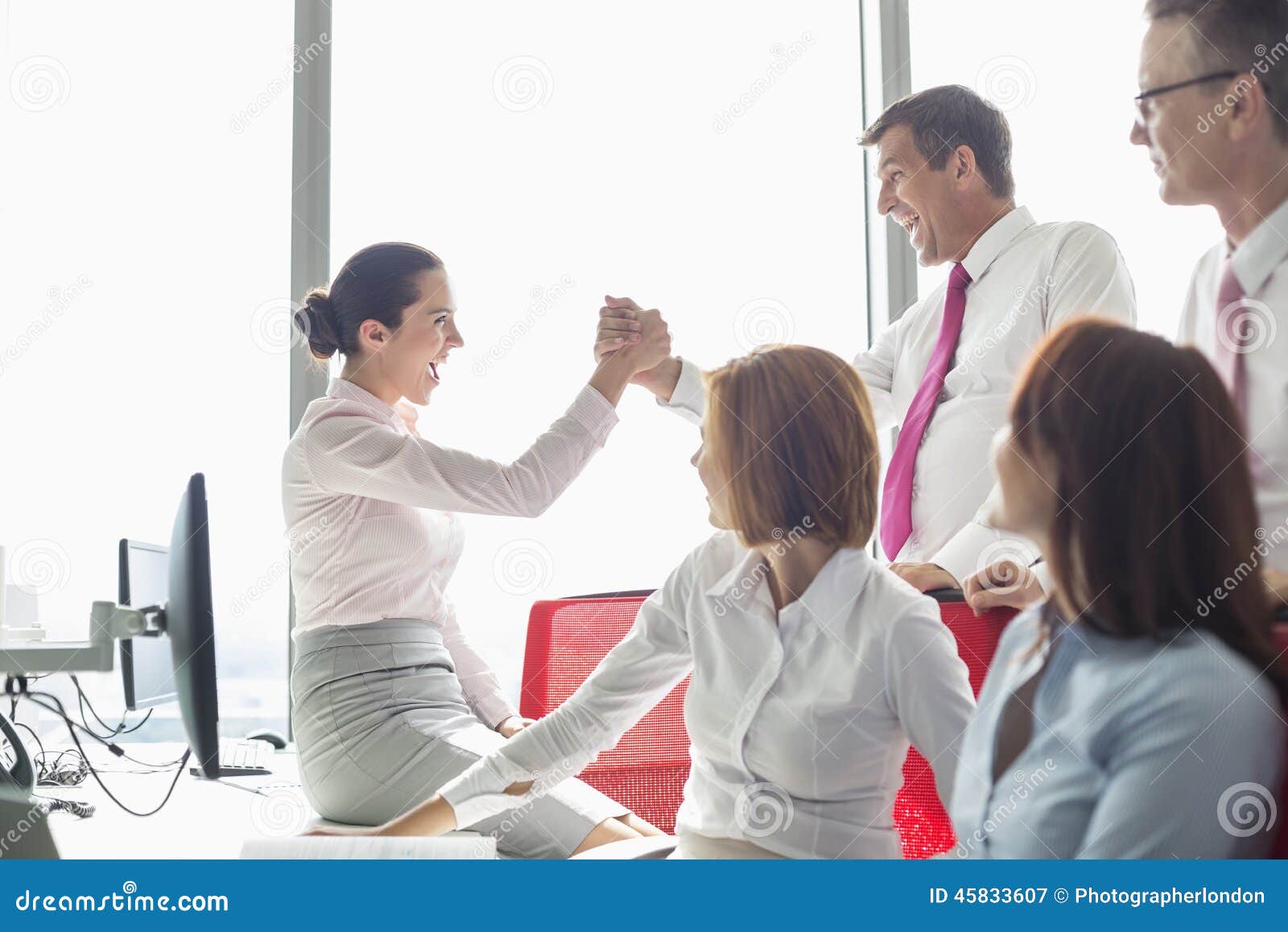 Businesspeople Celebrating Success in Office Stock Image - Image of ...