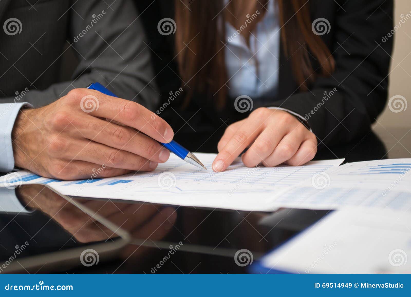 Businesspeople Checking a Document Stock Image - Image of meeting ...