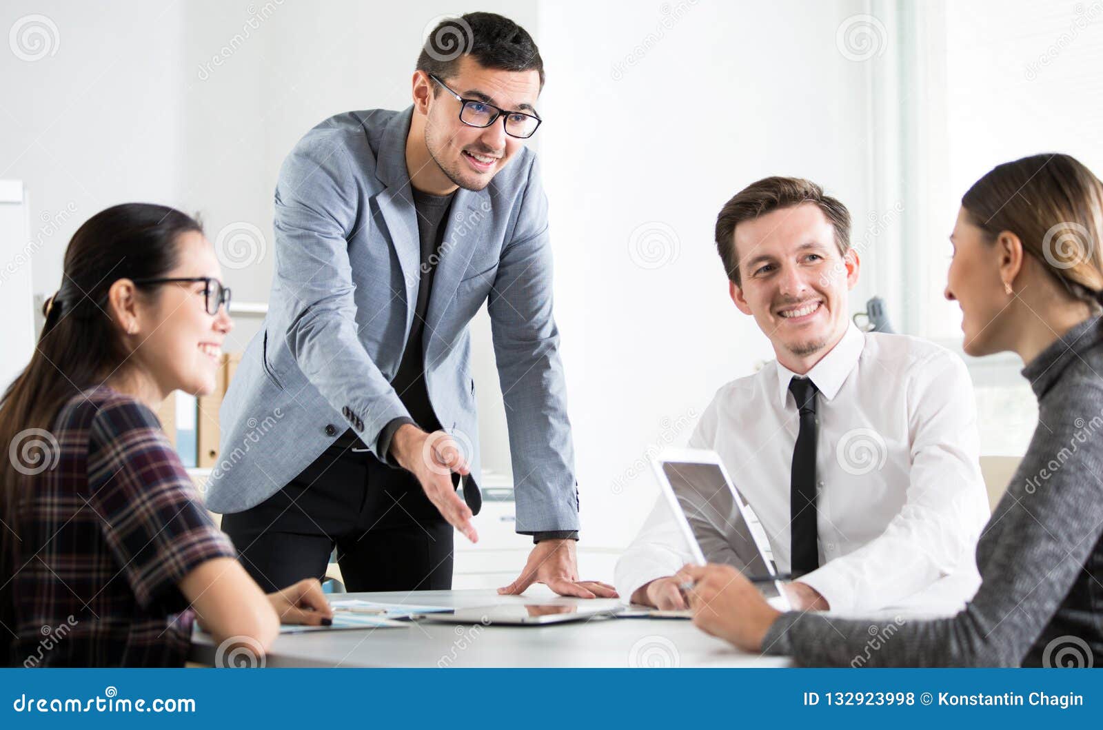 Businesspeople Discuss a New Project Stock Photo - Image of busy ...