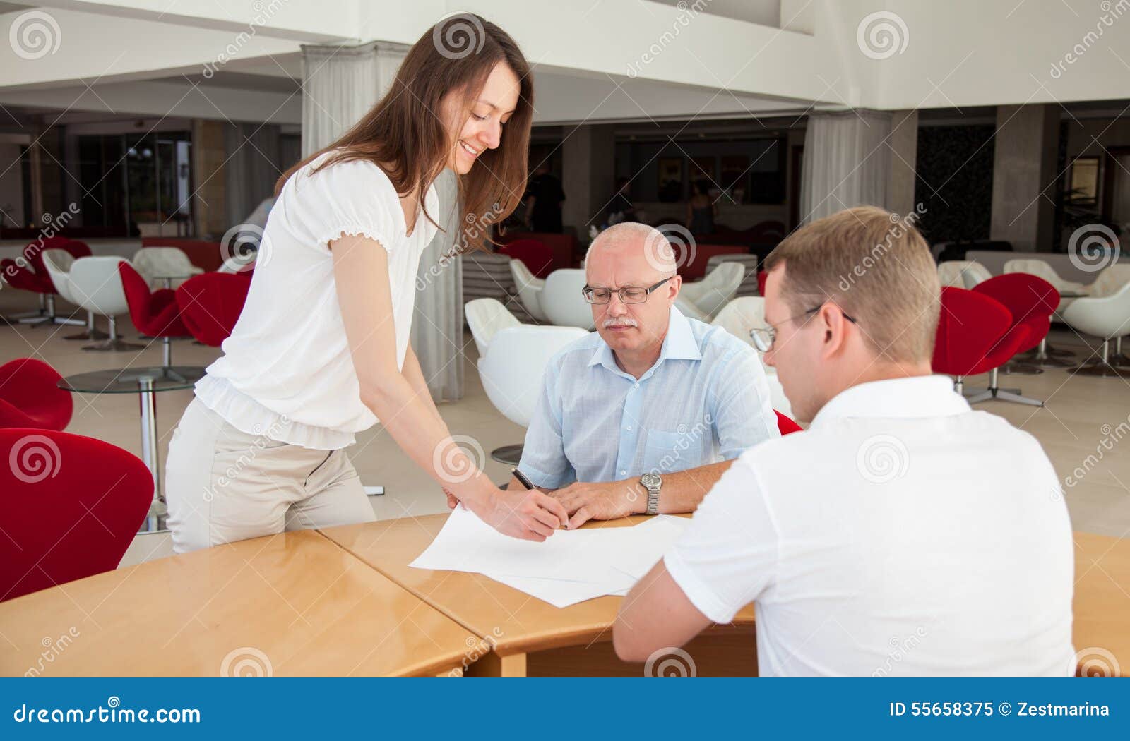 Businesspeople Discussing a Joint Project during Teamwork Stock Image ...