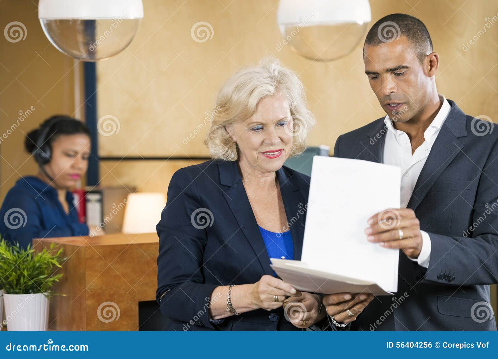 Businesspeople Discussing Over Documents Stock Photo - Image of project ...
