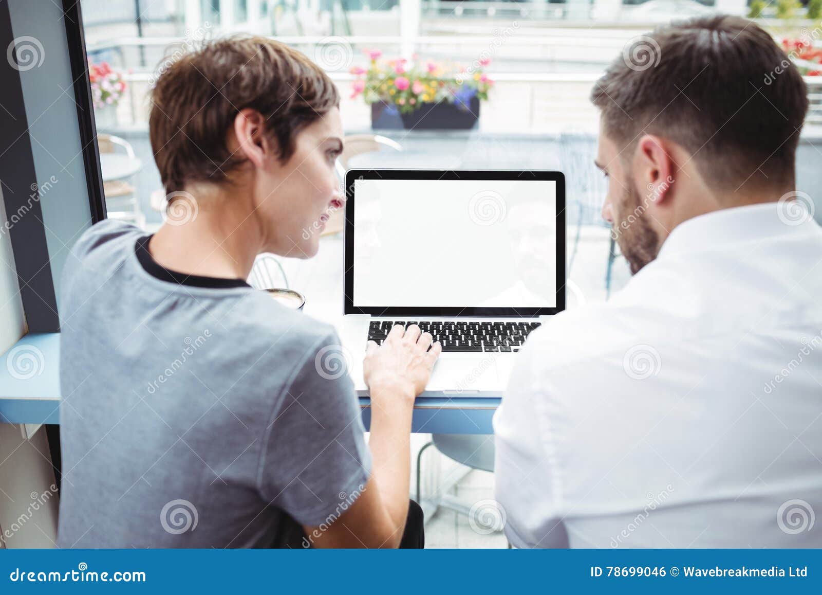 Businesspeople Discussing Over Laptop Stock Photo - Image of business ...