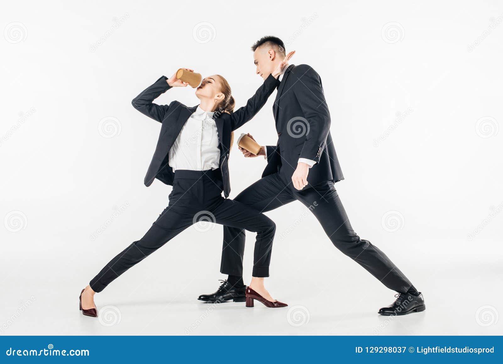 Businesspeople Fighting and Drinking Coffee in Suits Stock Image ...
