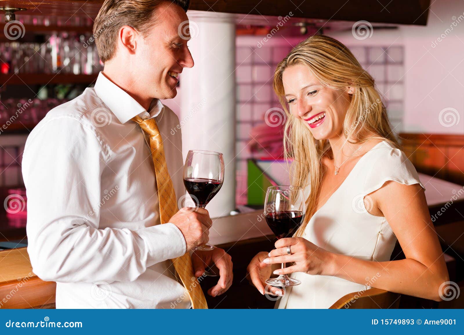 Businesspeople Flirting in Hotel Bar Stock Image - Image of night, male ...