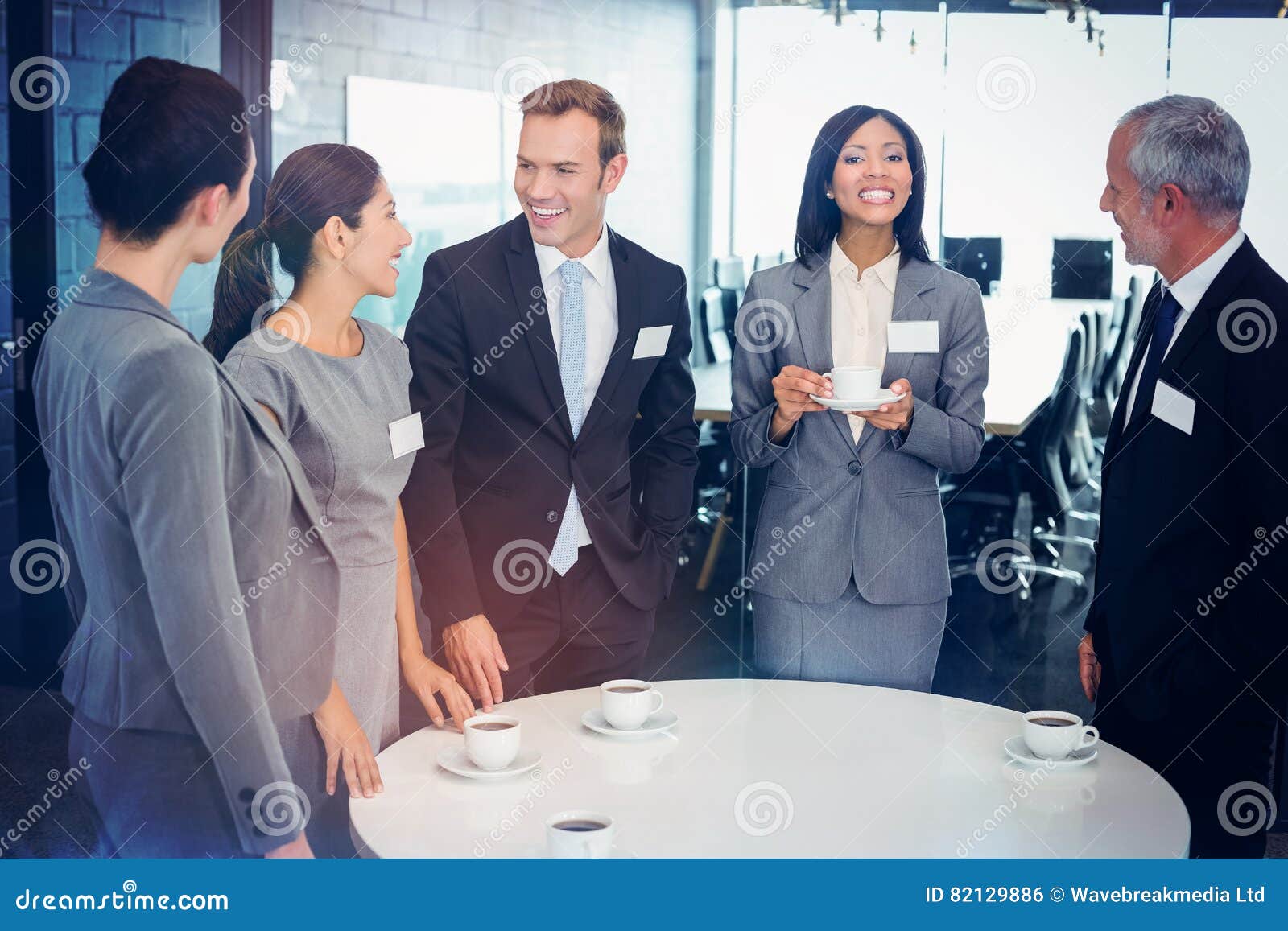 Businesspeople Having a Discussion during Breaktime Stock Photo - Image ...