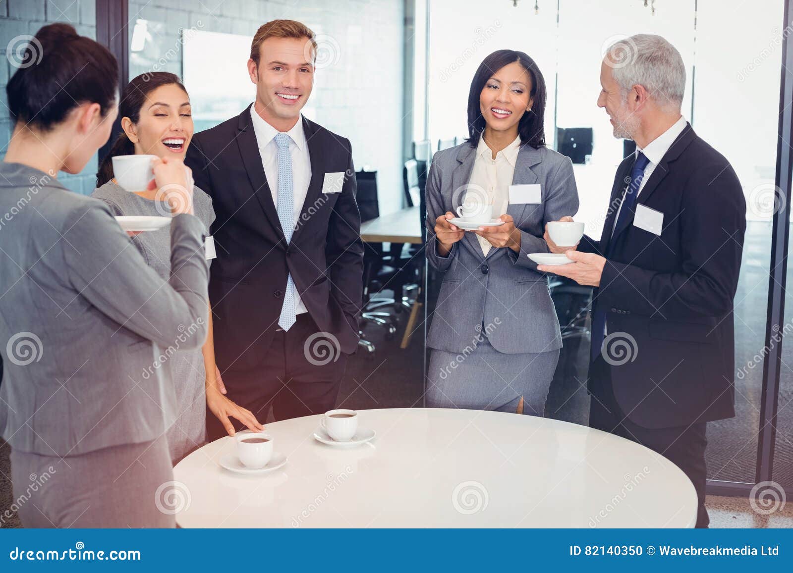 Businesspeople Having a Discussion during Breaktime Stock Photo - Image ...