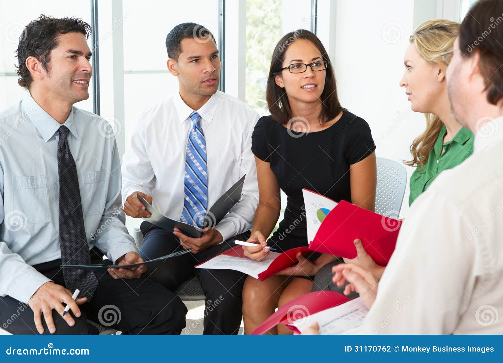 Businesspeople Having Informal Meeting Stock Photo - Image of caucasian ...