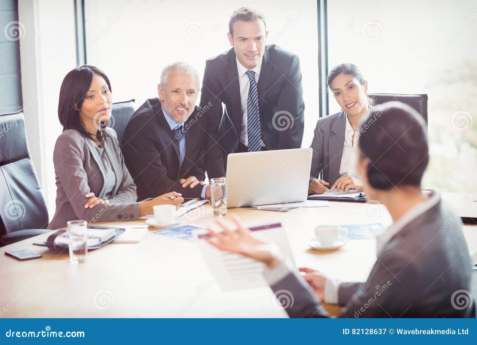 Businesspeople Interacting in Conference Room Stock Image - Image of ...