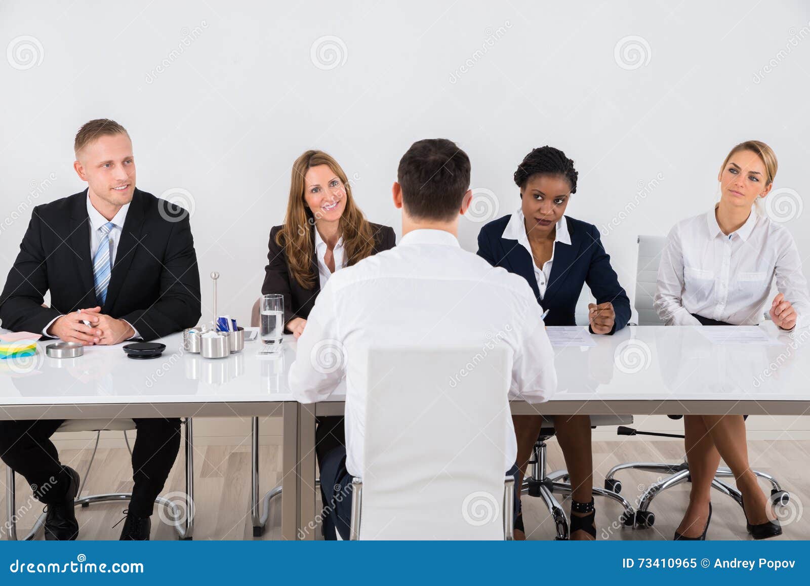 Businesspeople Interviewing Man Stock Image - Image of approval, hiring ...
