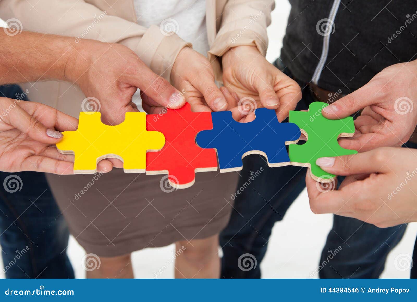 Businesspeople Joining Puzzle Pieces Stock Photo - Image of meeting ...