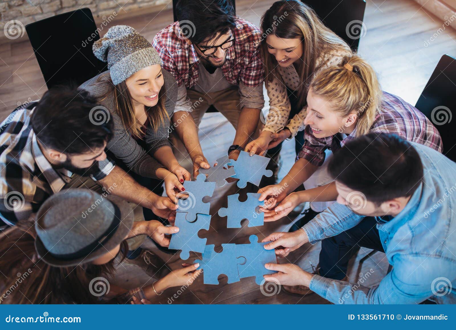 Businesspeople Joining Puzzle Pieces Stock Photo - Image of meeting ...