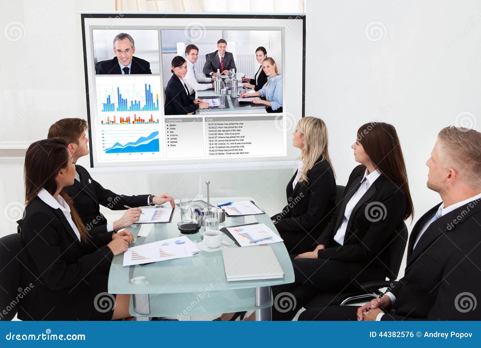 Businesspeople Looking at Projector Screen Stock Photo - Image of ...