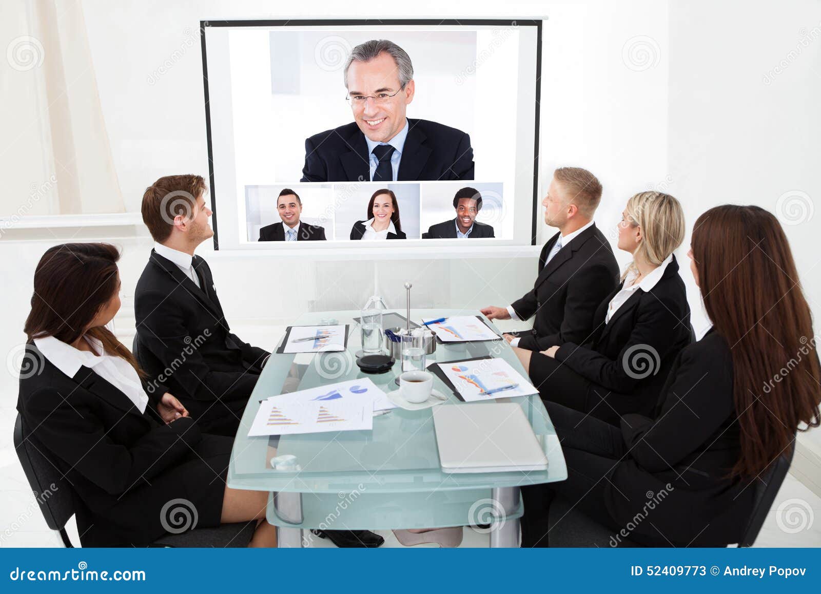 Businesspeople Looking at Projector Screen Stock Image - Image of ...