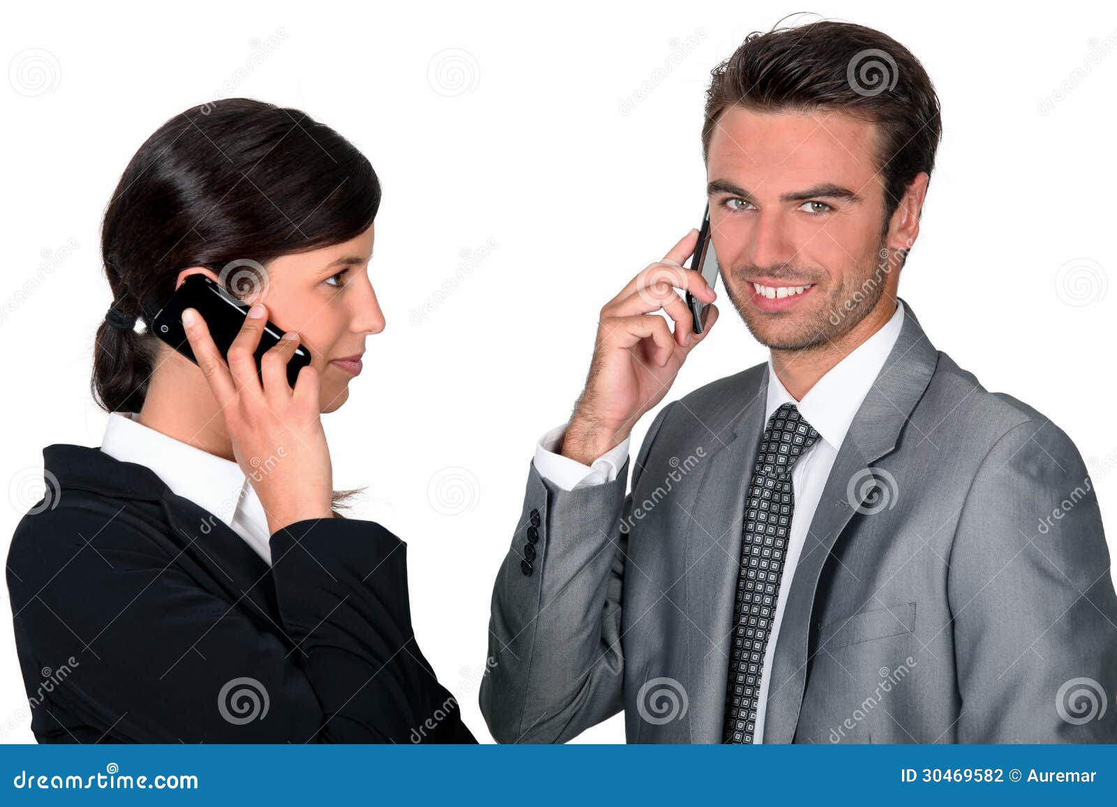 Businesspeople Making Simultaneous Calls Stock Photo - Image of ...