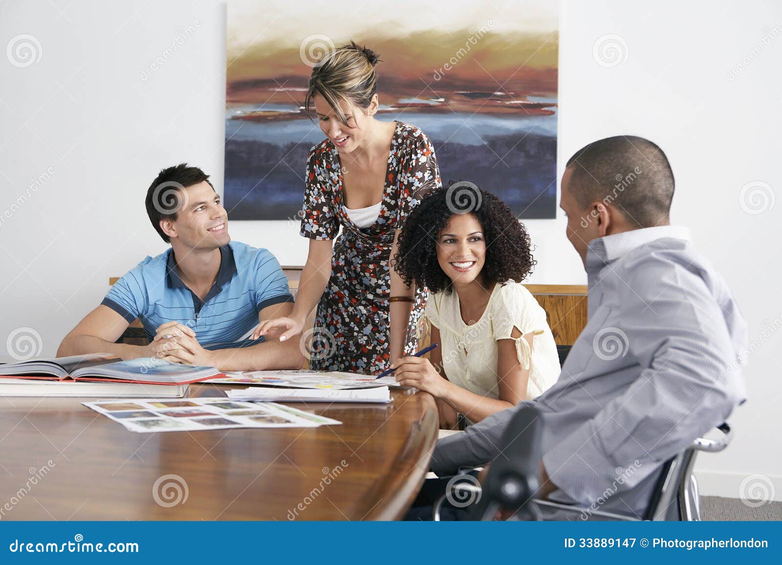 Businesspeople in Meeting at Conference Table Stock Image - Image of ...