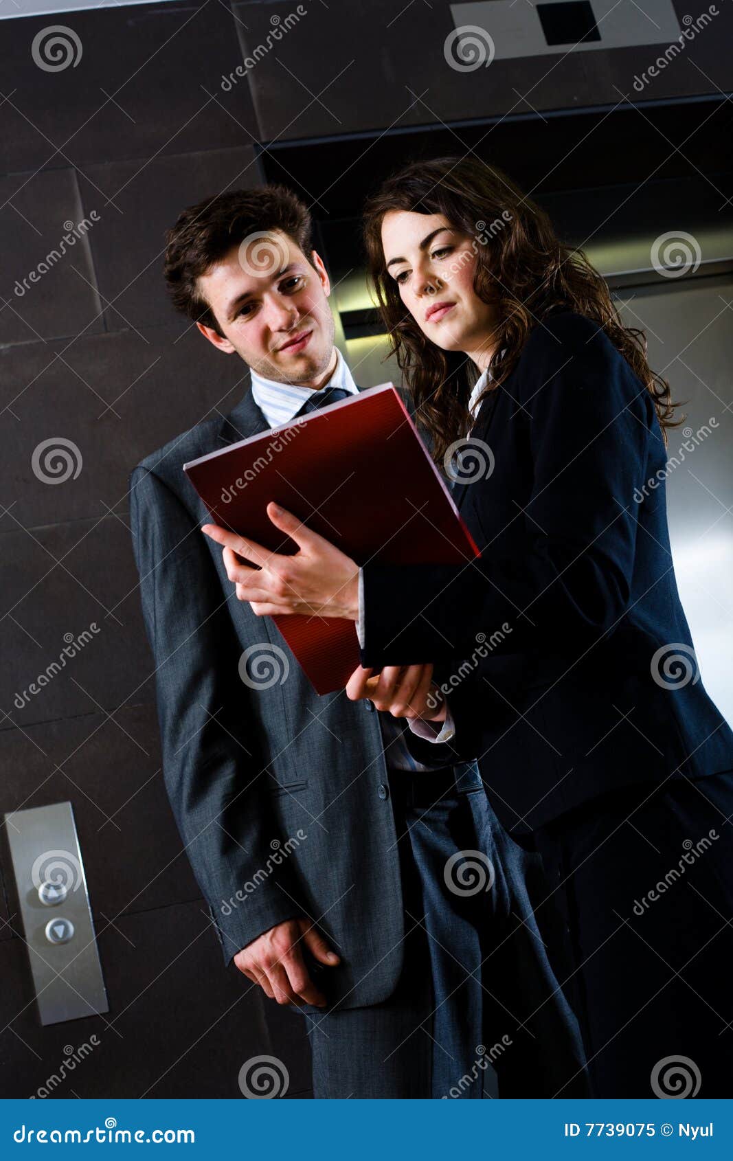 Businesspeople Reading Documents Stock Image - Image of colleagues ...