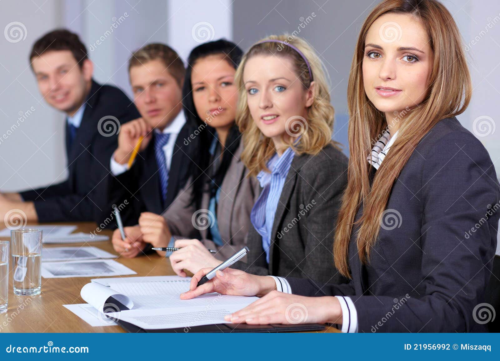 Businesspeople Sitting at Conference Table Stock Photo - Image of ...