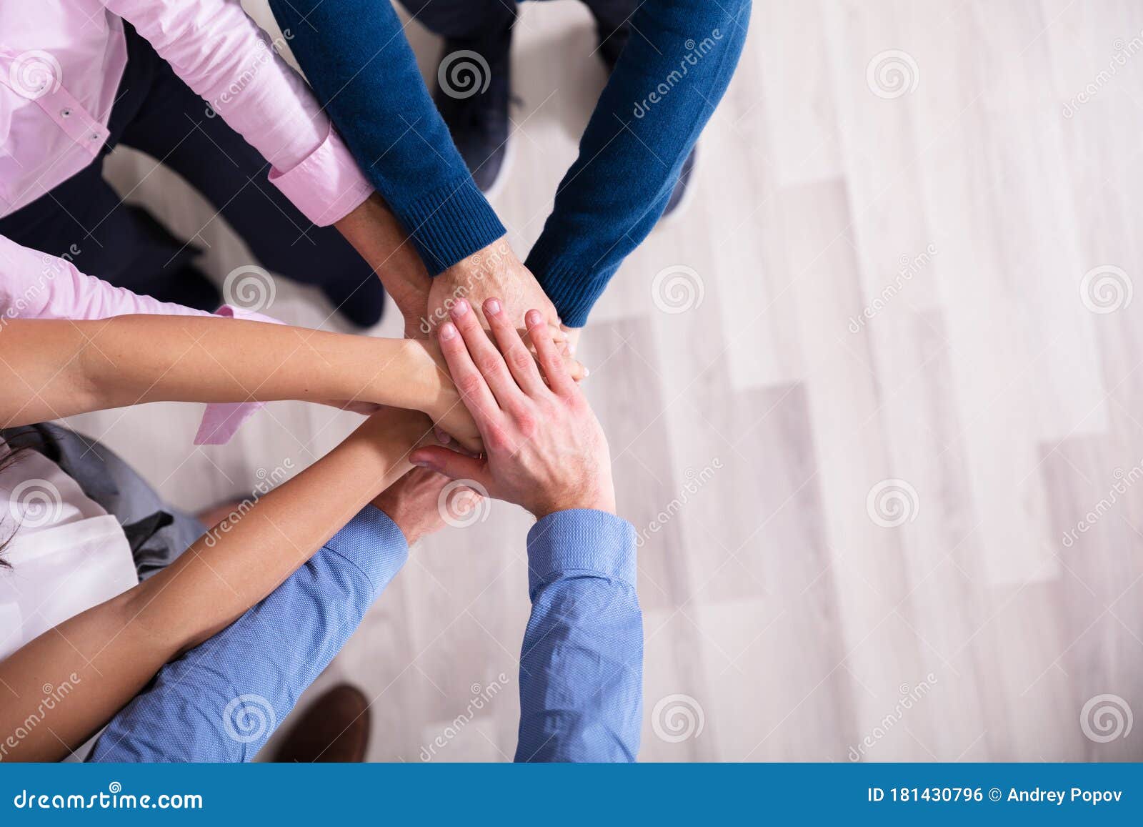 Businesspeople Stacking Hands Over Each Other Stock Photo - Image of ...