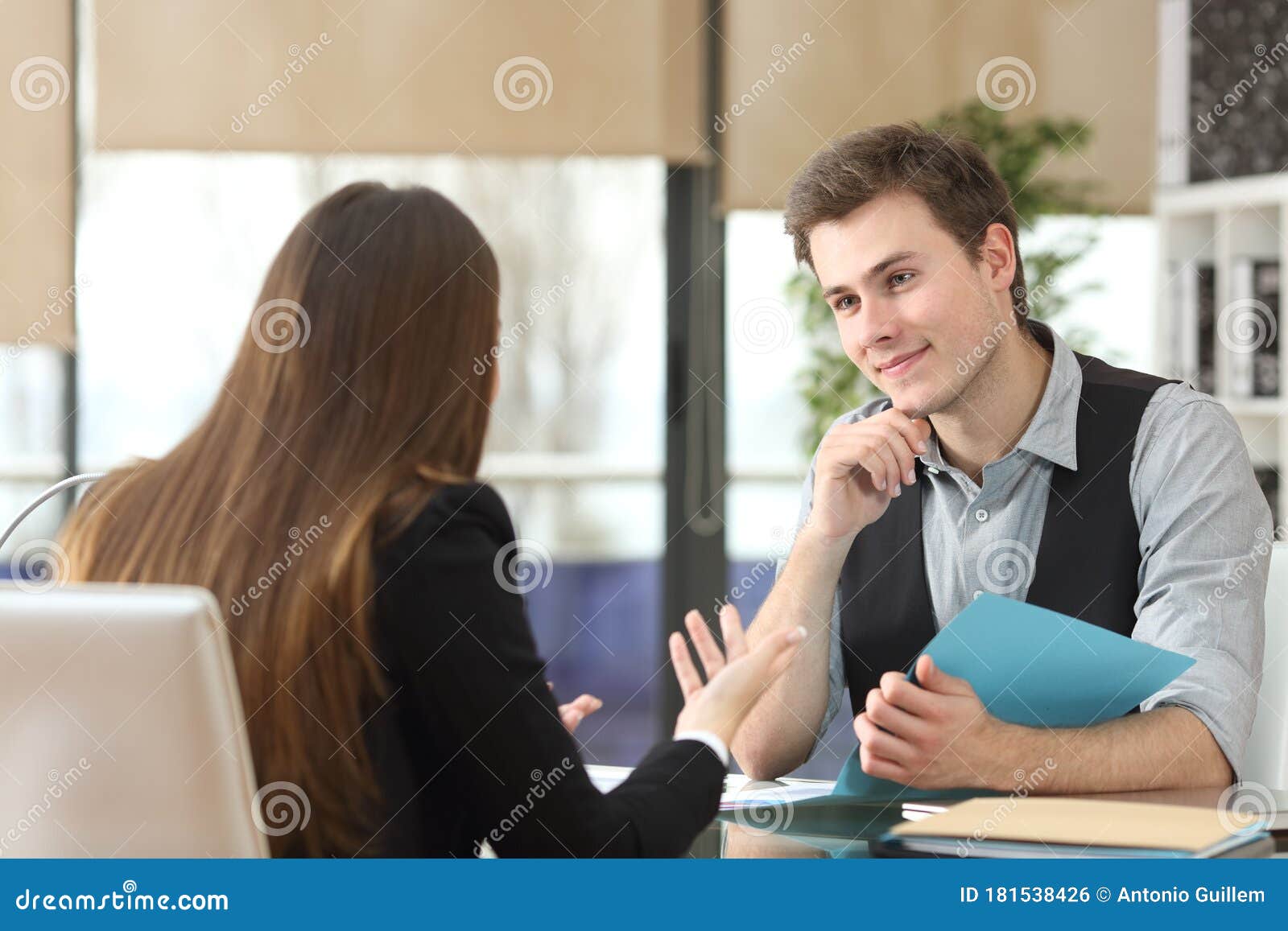 Businesspeople Talking during an Interview at Office Stock Photo ...