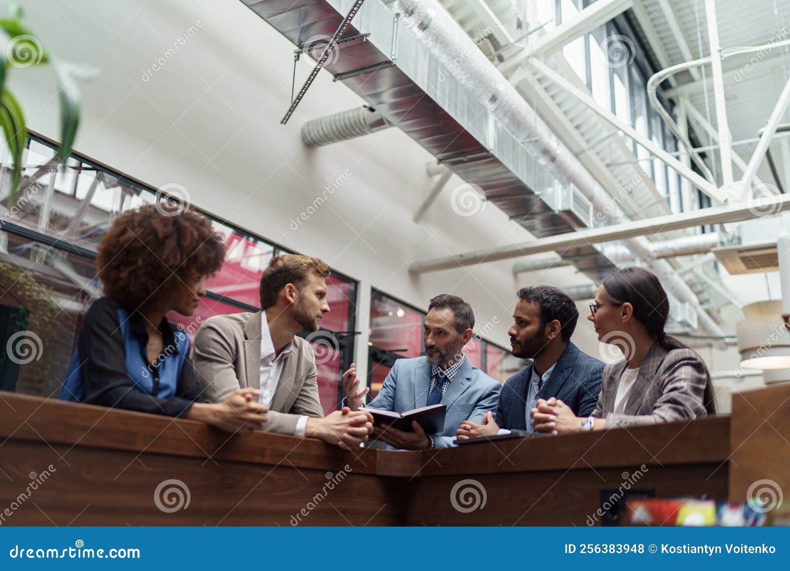 Multiethnic Group of Business People Talking in Office during Break ... Multiethnic Group of Business People Talking in Office during Break ...