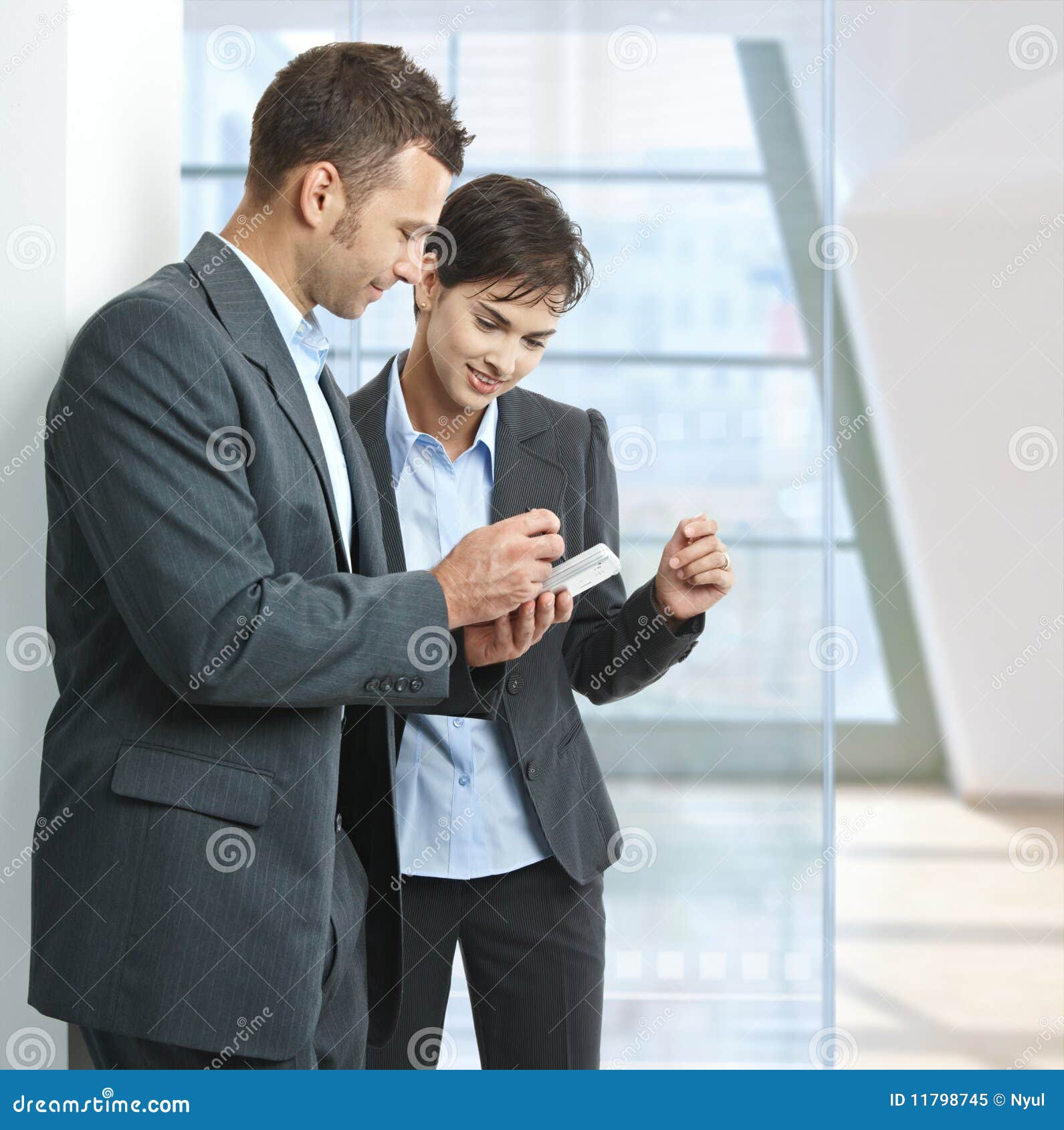 Businesspeople Using Mobile Stock Image - Image of adult, businesswoman ...