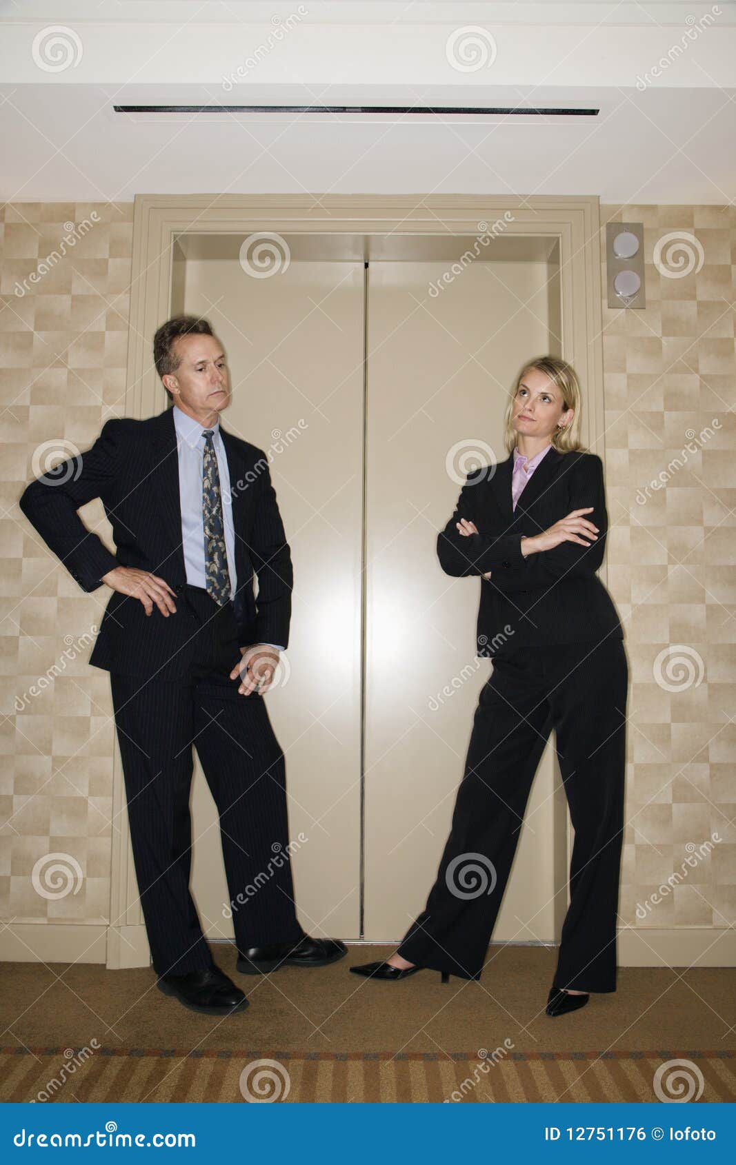 Businesspeople Waiting for Elevator Stock Photo - Image of full ...