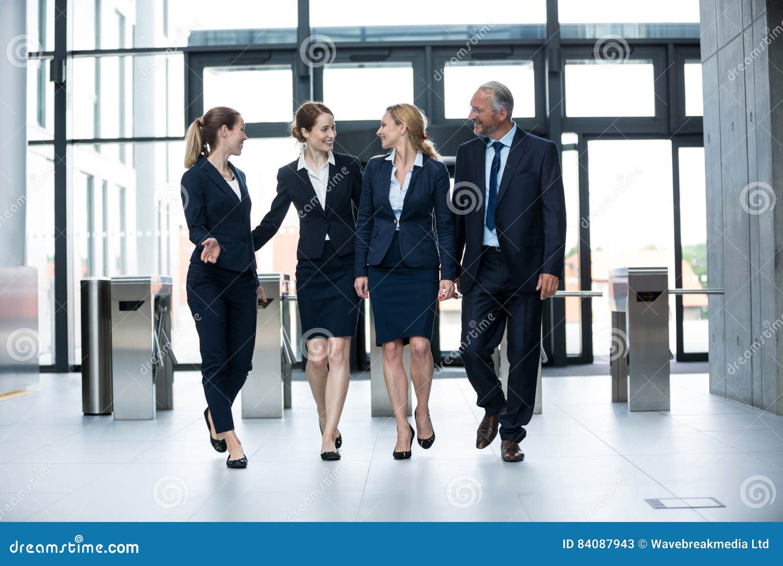 Businesspeople Walking in Office Stock Image - Image of lifestyle ...