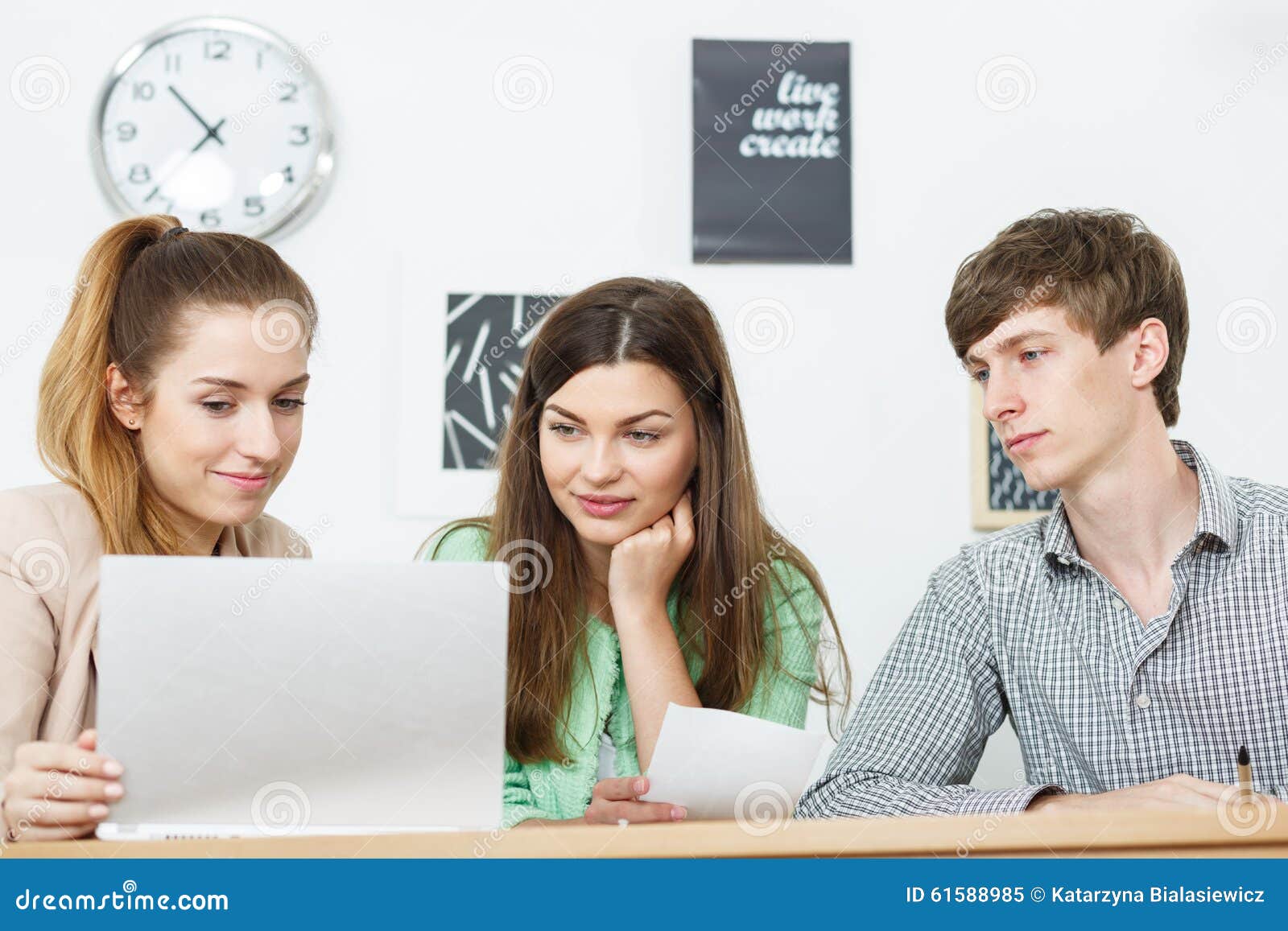 Businesspeople Watching Something on Laptop Stock Image - Image of ...
